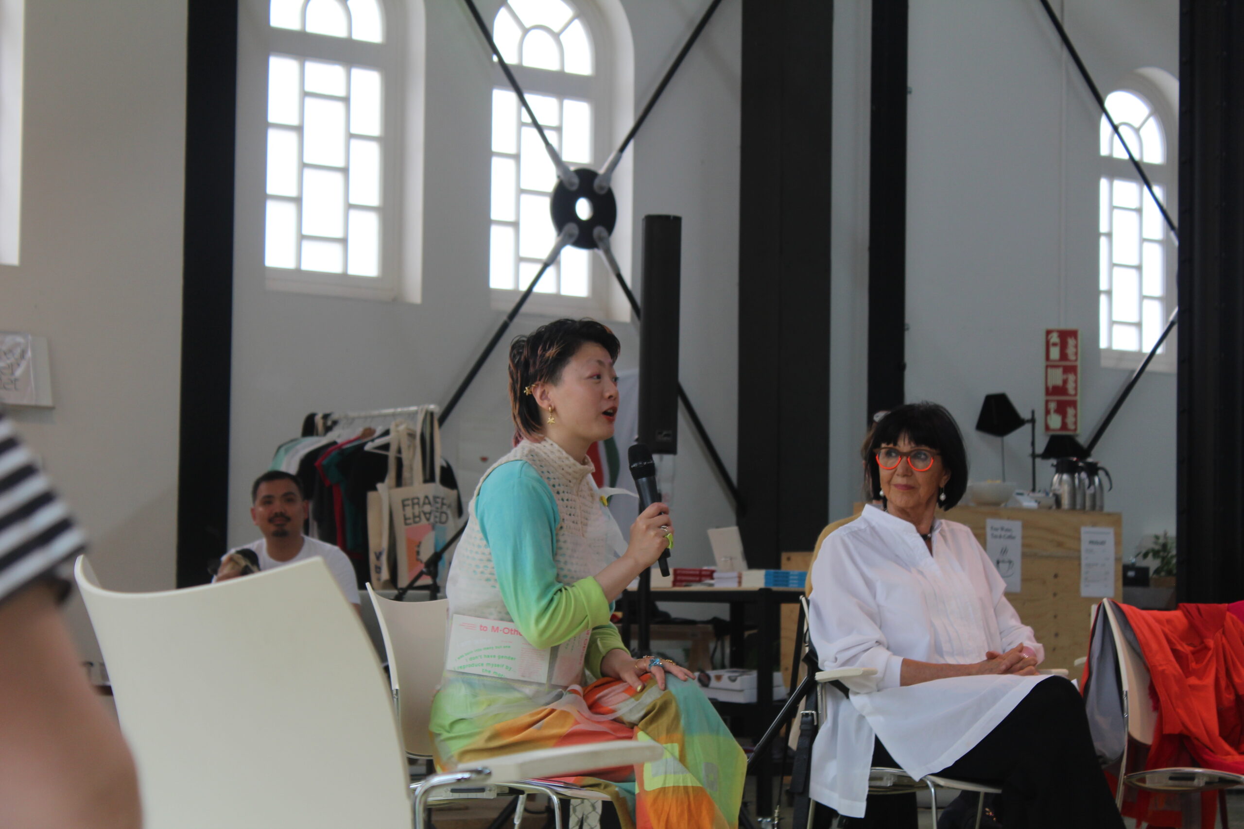 Sun Chang presenting to M•Others #2 during Queer Open Stage: Act 10 ...
