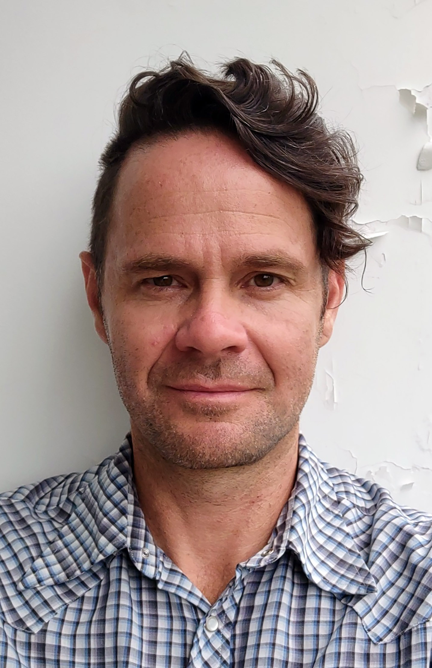 Roger headshot August 2023 – Framer Framed